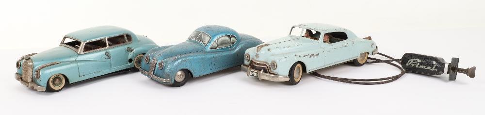 Three tinplate Motor cars, German 1950s