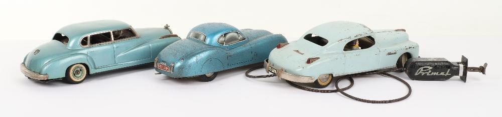 Three tinplate Motor cars, German 1950s