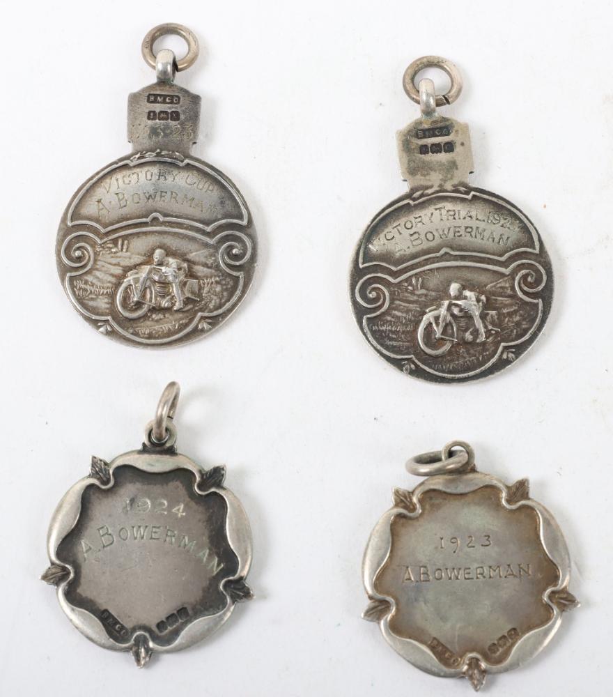 A group of silver motor cycling club medals awarded to A. Bowerman ...
