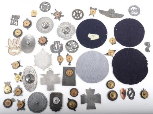 Grouping of Polish Military Badges and Insignia