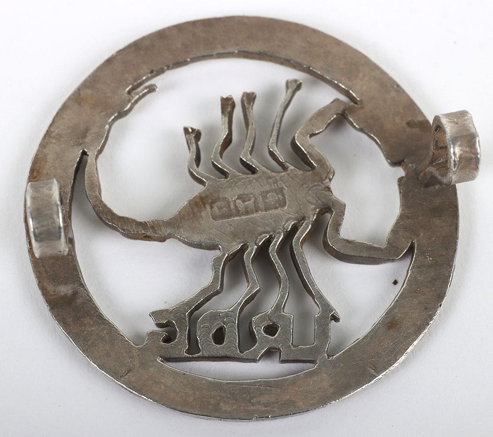 WW2 Cairo Made Silver Long Range Desert Group (L.R.D.G) Cap Badge