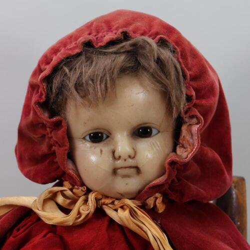 A wax over composition shoulder head doll, German circa 1860,