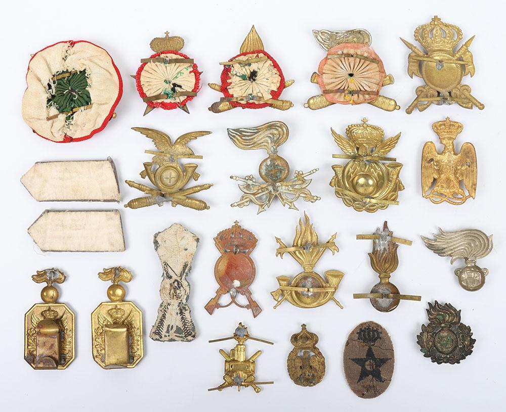 Grouping of WW2 Italian Fascist Headdress Badges