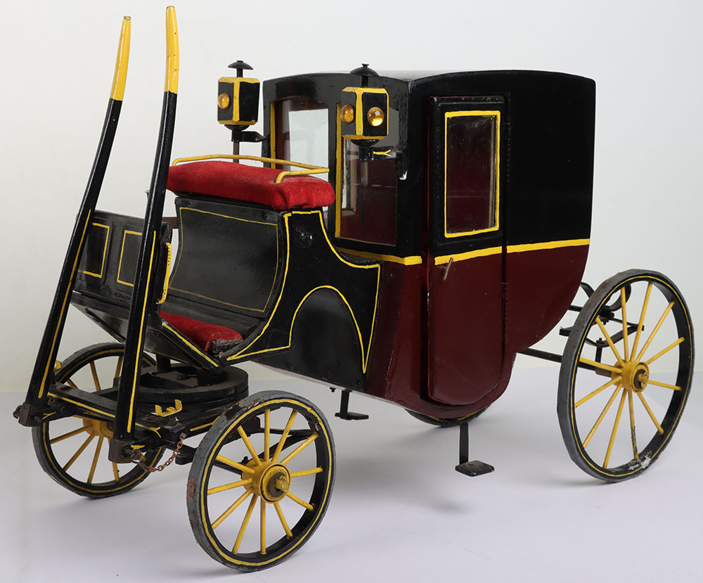 Two wooden model Victorian style carriages,