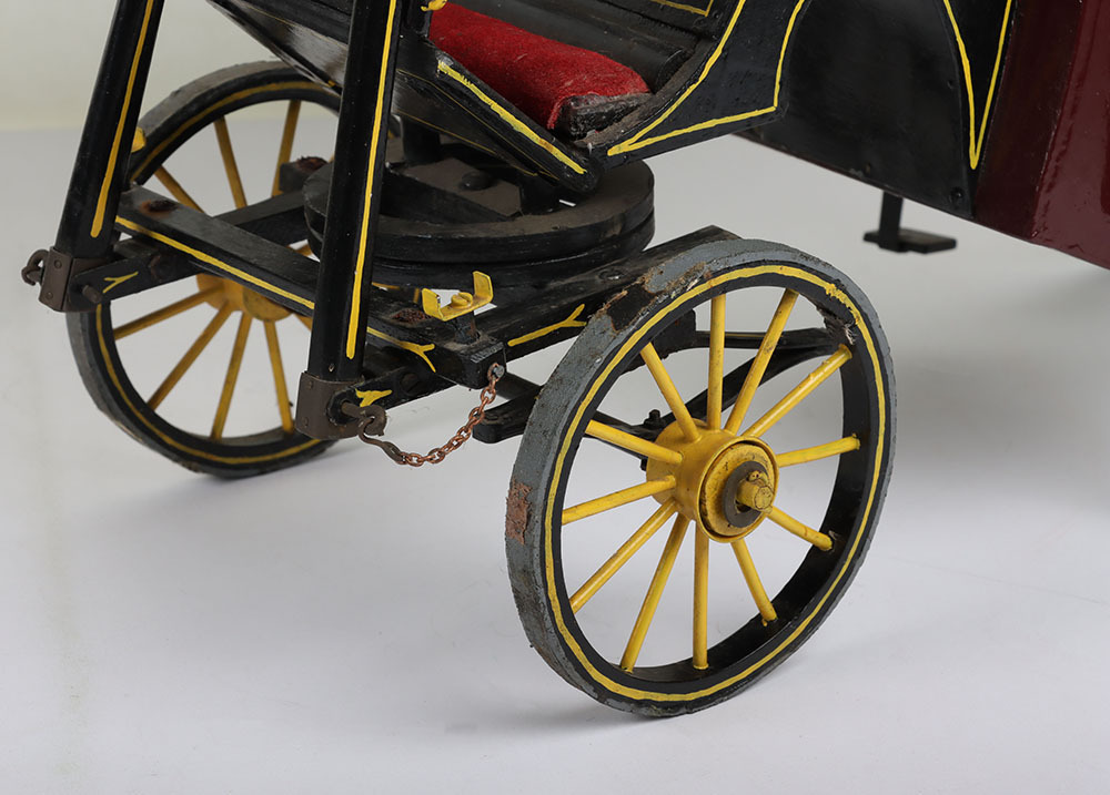Two wooden model Victorian style carriages,