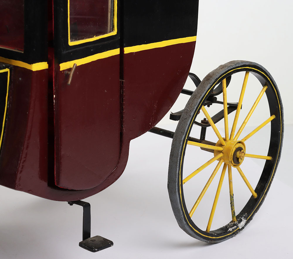 Two wooden model Victorian style carriages,