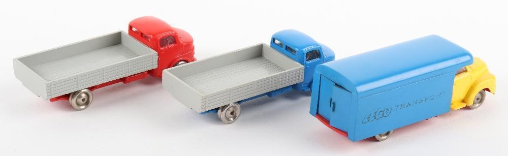 Three vintage Lego trucks