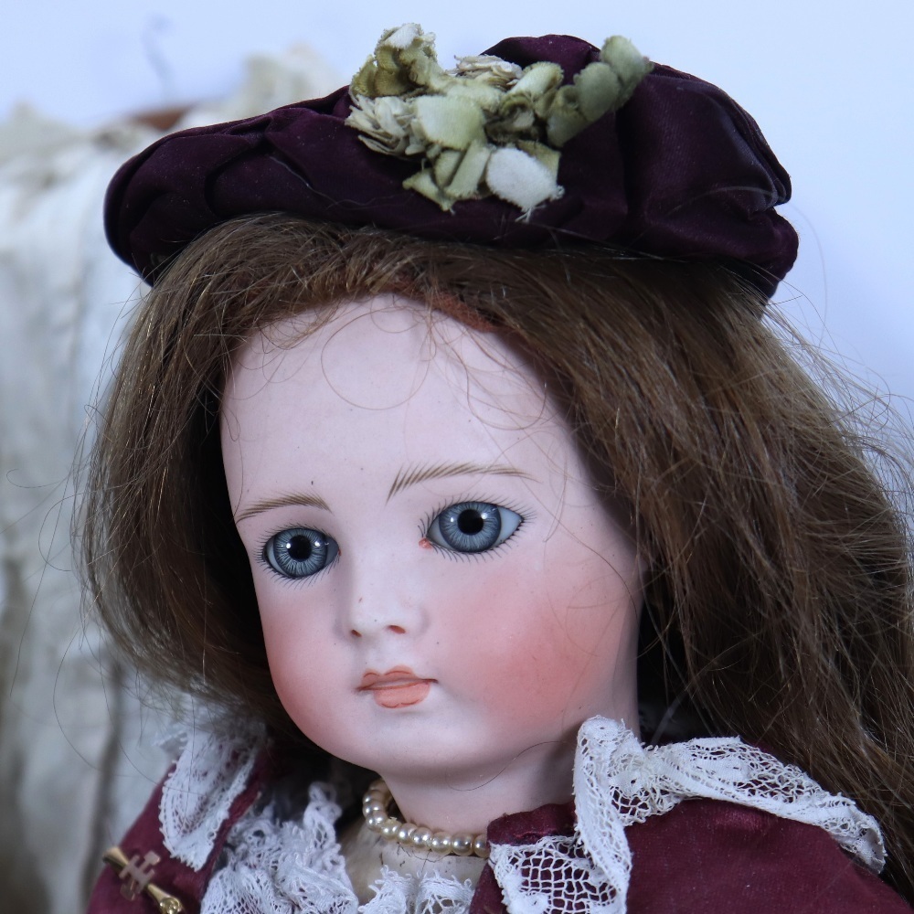 A Belton-type bisque head doll and trousseau, probably Bahr & Proschild ...