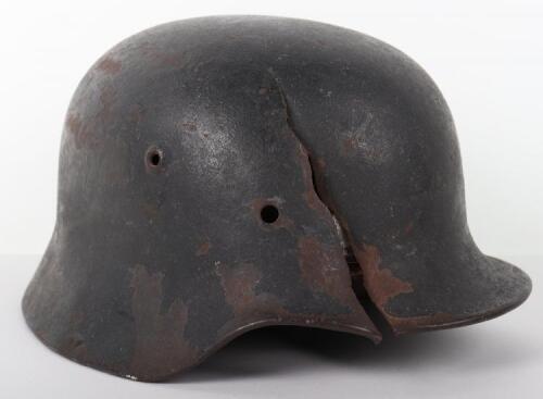 WW2 Luftwaffe Battle Damaged Steel Combat Helmet