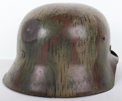 German Army / Luftwaffe M-42 Battle Damaged Steel Combat Helmet