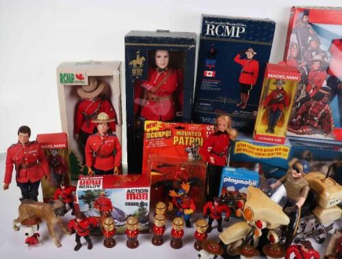 A quantity of action figures and Action Men, An RCMP Elite porcelain ...
